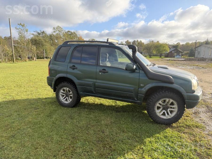 Zaļš Suzuki grand-vitara 2003 Liepāja, ar dzinēja tilpumu 2.00 L un nobraukumu 275 tūkst. km par 3200 €, foto 3 vietnē AUTOMOTO.COM.LV
