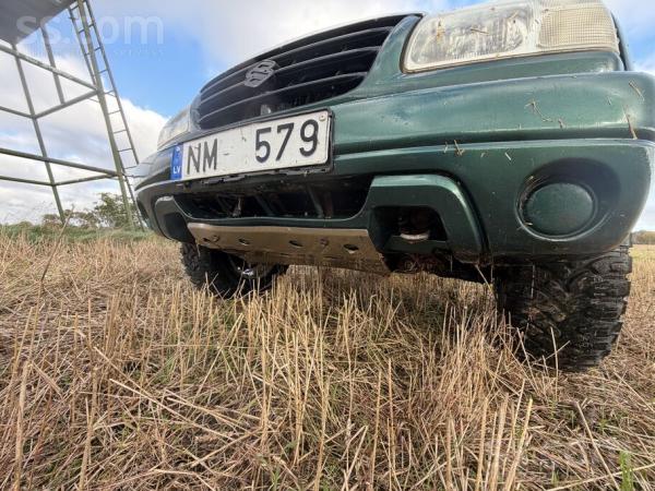 Zaļš Suzuki grand-vitara 2003 Liepāja, ar dzinēja tilpumu 2.00 L un nobraukumu 275 tūkst. km par 3200 €, foto 8 vietnē AUTOMOTO.COM.LV