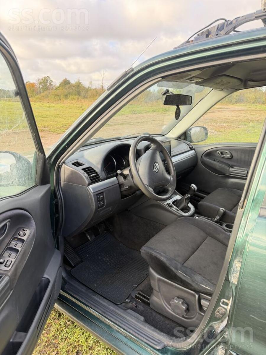 Zaļš Suzuki grand-vitara 2003 Liepāja, ar dzinēja tilpumu 2.00 L un nobraukumu 275 tūkst. km par 3200 €, foto 12 vietnē AUTOMOTO.COM.LV
