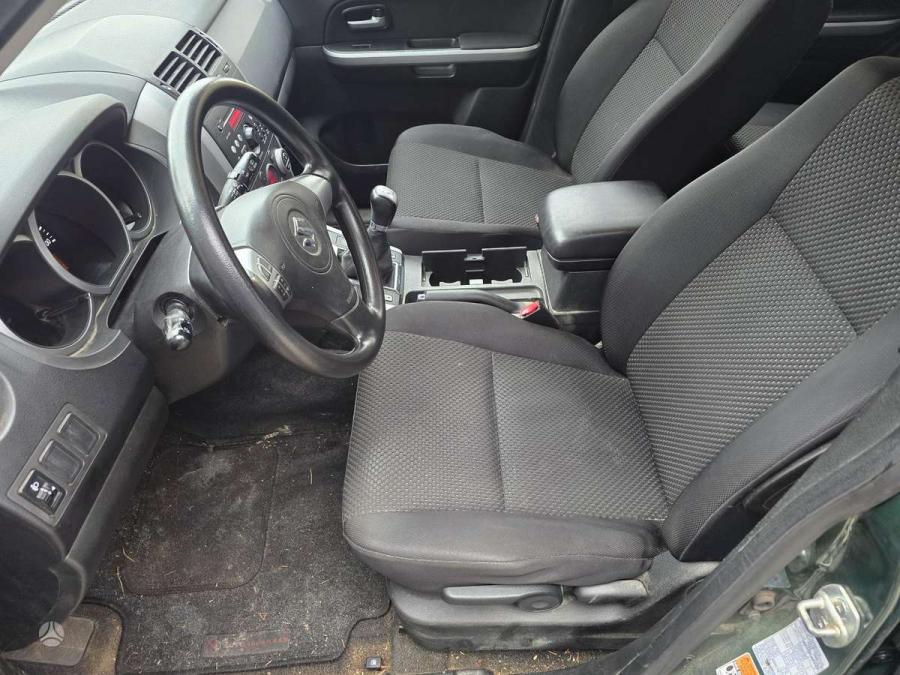 Green Suzuki grand-vitara 2009 in Vilnius, with an engine capacity of 2.00 L and mileage of 128 thousand km for 2500 €, photo 12 on AUTOMOTO.COM.LV