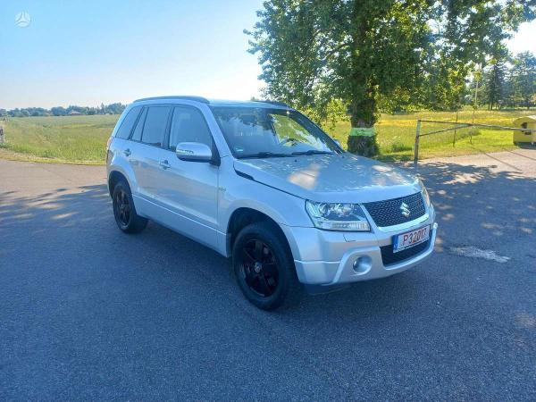 Grey Suzuki grand-vitara 2012 in Kaunas, with an engine capacity of 1.87 L and mileage of 229 thousand km for 5299 €, photo 2 on AUTOMOTO.COM.LV