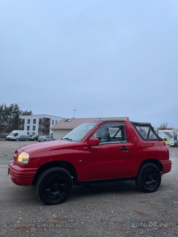 Red Suzuki grand-vitara 2000 in Tallinn, with an engine capacity of 2.00 L and mileage of 110 thousand km for 3900 €, photo 5 on AUTOMOTO.COM.LV