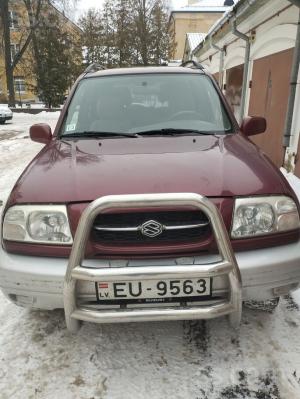 Red Suzuki grand-vitara 2000 in Daugavpils, with an engine capacity of 2.50 L and mileage of 240 thousand km for 2700 €, photo 3 on AUTOMOTO.COM.LV