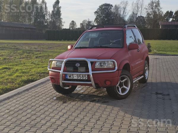 Sarkans Suzuki grand-vitara 2003 Valka, ar dzinēja tilpumu 1.60 L un nobraukumu 240 tūkst. km par 1000 €, foto 1 vietnē AUTOMOTO.COM.LV