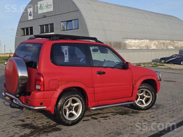 Sarkans Suzuki grand-vitara 2003 Valka, ar dzinēja tilpumu 1.60 L un nobraukumu 240 tūkst. km par 1000 €, foto 9 vietnē AUTOMOTO.COM.LV