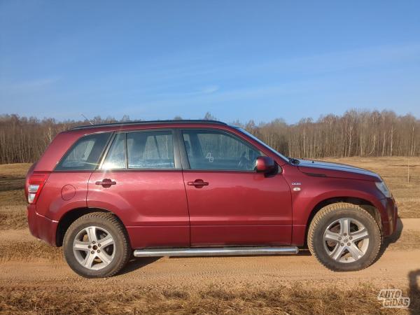 Red Suzuki grand-vitara 2007 in Utena, with an engine capacity of 1.90 L and mileage of 232 thousand km for 3500 €, photo 6 on AUTOMOTO.COM.LV