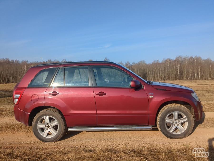 Red Suzuki grand-vitara 2007 in Utena, with an engine capacity of 1.90 L and mileage of 232 thousand km for 3500 €, photo 7 on AUTOMOTO.COM.LV