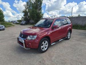 Red Suzuki grand-vitara 2012 in Utena, with an engine capacity of 1.87 L and mileage of 248 thousand km for 5650 €, photo  on AUTOMOTO.COM.LV