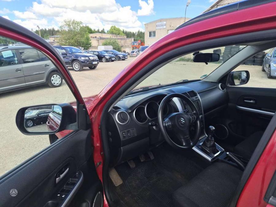 Red Suzuki grand-vitara 2012 in Utena, with an engine capacity of 1.87 L and mileage of 248 thousand km for 5650 €, photo 12 on AUTOMOTO.COM.LV