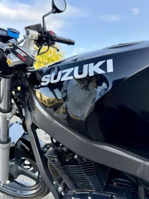 Melns Suzuki GS 1996 Alīta, ar dzinēja tilpumu 0.49 L un nobraukumu 18 tūkst. km par 980 €, foto 7 vietnē AUTOMOTO.COM.LV