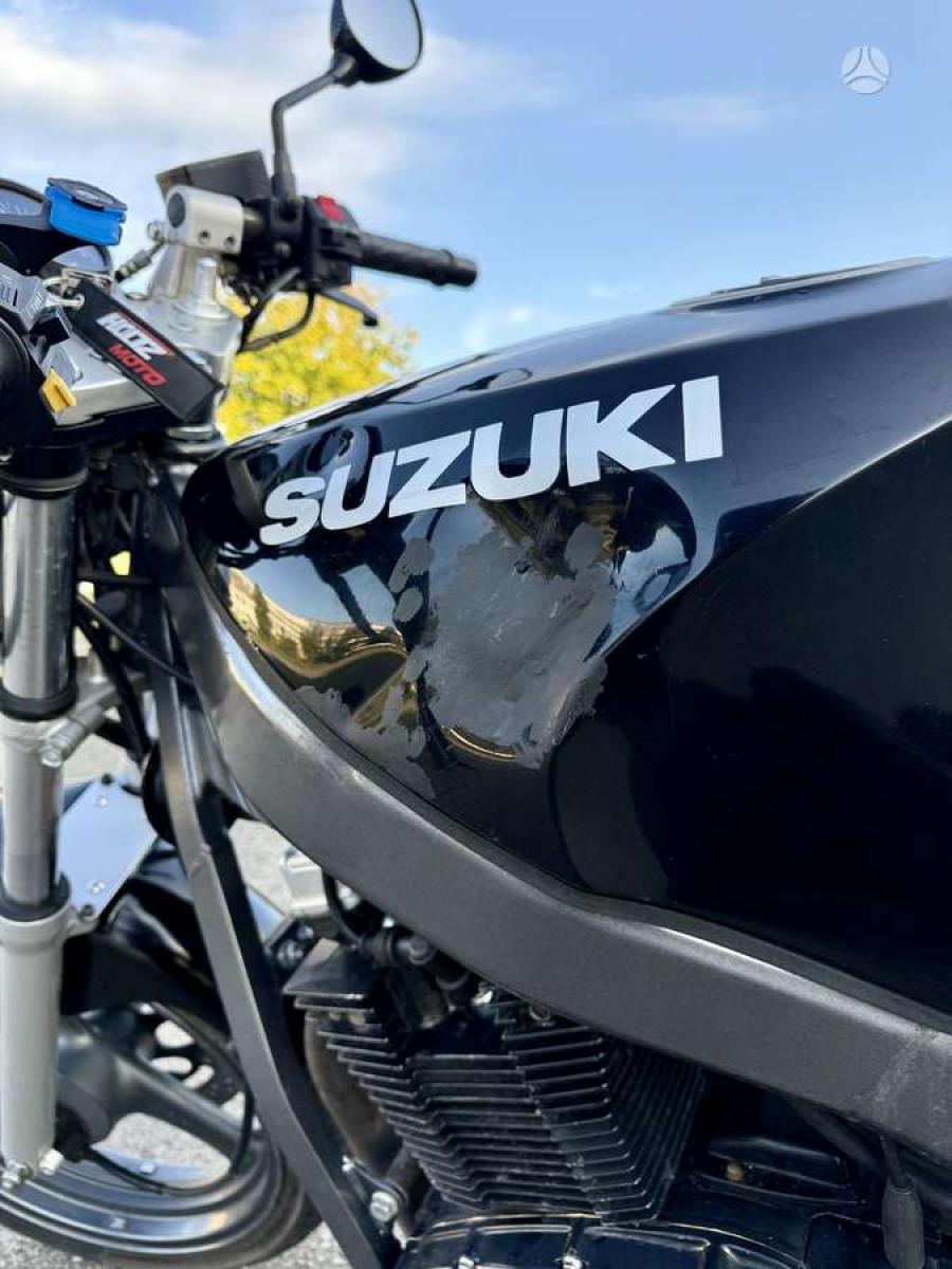 Melns Suzuki GS 1996 Alīta, ar dzinēja tilpumu 0.49 L un nobraukumu 18 tūkst. km par 980 €, foto 7 vietnē AUTOMOTO.COM.LV