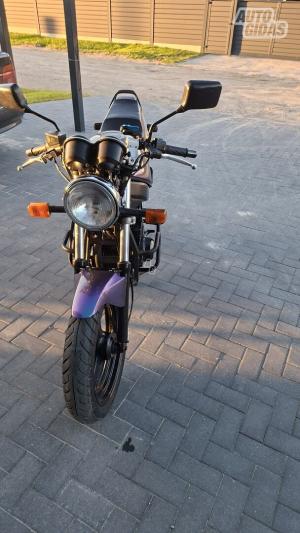 Violets Suzuki GS 1993 Plungė, ar dzinēja tilpumu 0.49 L un nobraukumu 18 tūkst. km par 900 €, foto 4 vietnē AUTOMOTO.COM.LV
