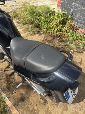 Black Suzuki GSF 1997 in Vilnius, with an engine capacity of 0.60 L and mileage of 0 thousand km for 1800 €, photo 9 on AUTOMOTO.COM.LV