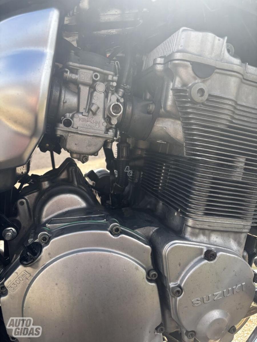 Black Suzuki GSF 1997 in Vilnius, with an engine capacity of 0.60 L and mileage of 0 thousand km for 1800 €, photo 13 on AUTOMOTO.COM.LV