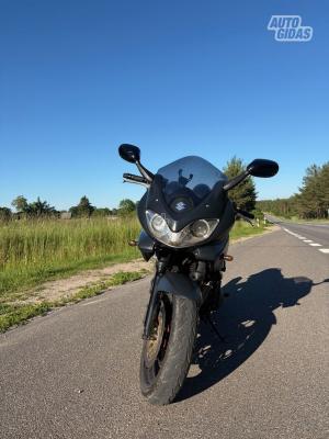 Melns Suzuki GSF 2000 Viļņa, ar dzinēja tilpumu 0.60 L un nobraukumu 53 tūkst. km par 1700 €, foto 4 vietnē AUTOMOTO.COM.LV