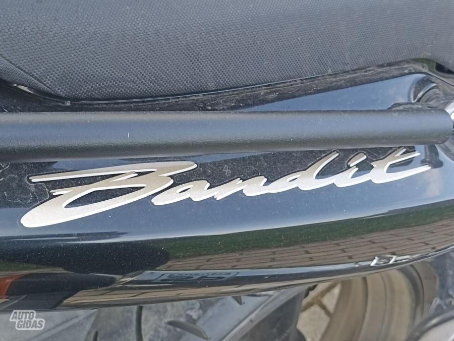 Melns Suzuki GSF 2000 Kauņa, ar dzinēja tilpumu 0.60 L un nobraukumu 0 tūkst. km par 1850 €, foto 13 vietnē AUTOMOTO.COM.LV