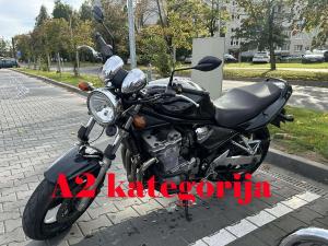 Melns Suzuki GSF 2000 Viļņa, ar dzinēja tilpumu 0.60 L un nobraukumu 45 tūkst. km par 1600 €, foto  vietnē AUTOMOTO.COM.LV