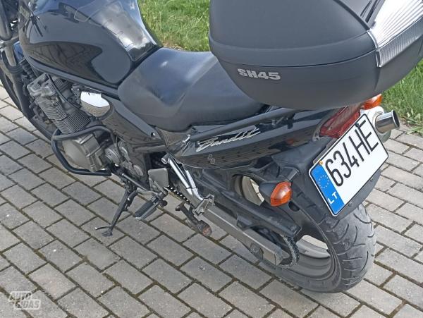 Melns Suzuki GSF 2000 Kauņa, ar dzinēja tilpumu 0.60 L un nobraukumu 0 tūkst. km par 1850 €, foto 5 vietnē AUTOMOTO.COM.LV