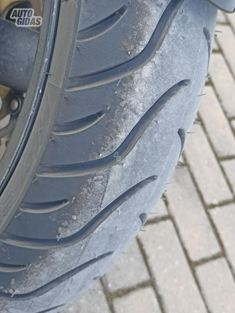 Melns Suzuki GSF 2000 Kauņa, ar dzinēja tilpumu 0.60 L un nobraukumu 0 tūkst. km par 1850 €, foto 12 vietnē AUTOMOTO.COM.LV