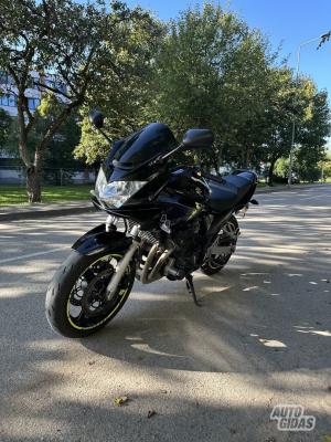 Melns Suzuki GSF 2006 Jonava, ar dzinēja tilpumu 0.65 L un nobraukumu 34 tūkst. km par 1500 €, foto  vietnē AUTOMOTO.COM.LV