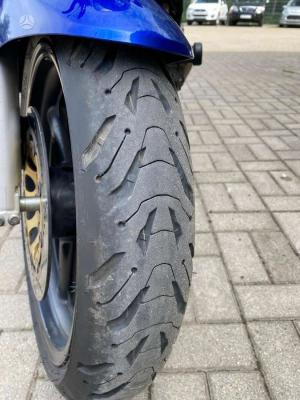 Zils Suzuki GSF 2001 Jonava, ar dzinēja tilpumu 0.60 L un nobraukumu 19 tūkst. km par 2000 €, foto 12 vietnē AUTOMOTO.COM.LV