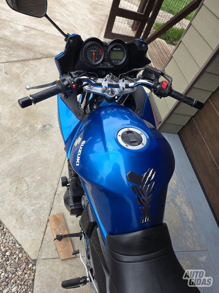 Zils Suzuki GSF 2007 Pasvalys, ar dzinēja tilpumu 0.65 L un nobraukumu 49 tūkst. km par 1499 €, foto 23 vietnē AUTOMOTO.COM.LV