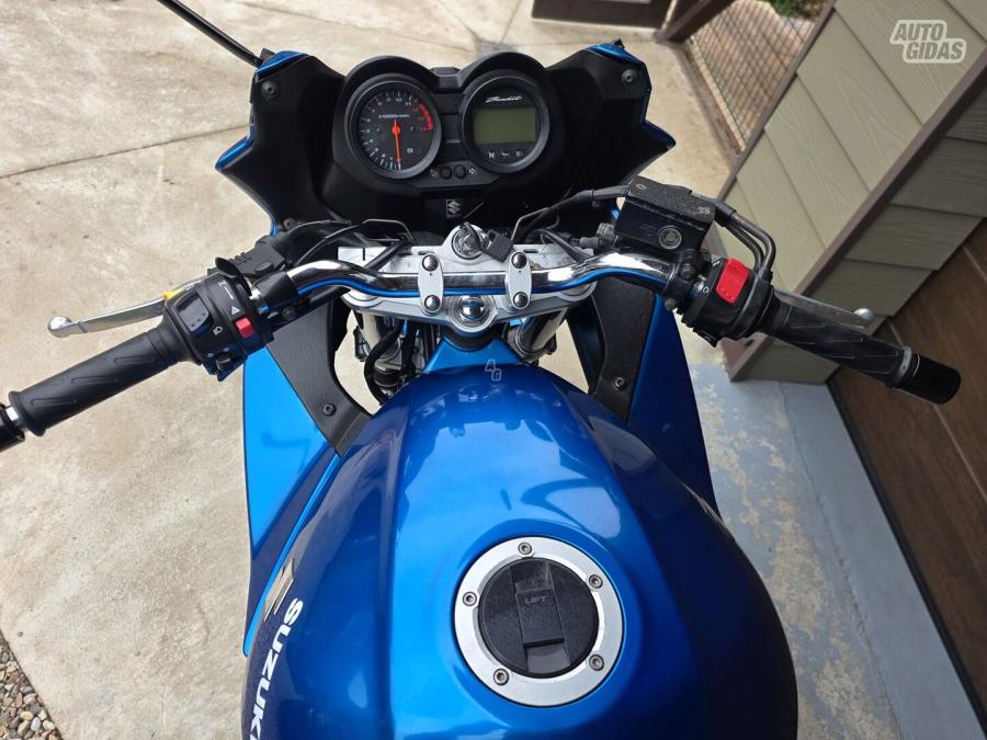 Zils Suzuki GSF 2007 Pasvalys, ar dzinēja tilpumu 0.65 L un nobraukumu 49 tūkst. km par 1499 €, foto 24 vietnē AUTOMOTO.COM.LV