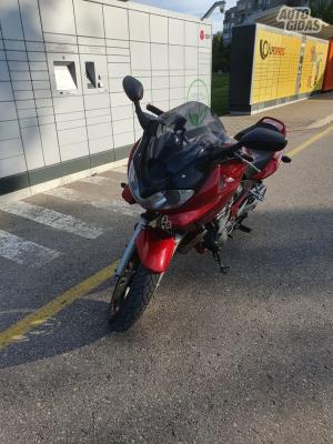 Red Suzuki GSF 2002 in Alytus, with an engine capacity of 0.60 L and mileage of 41 thousand km for 1650 €, photo  on AUTOMOTO.COM.LV