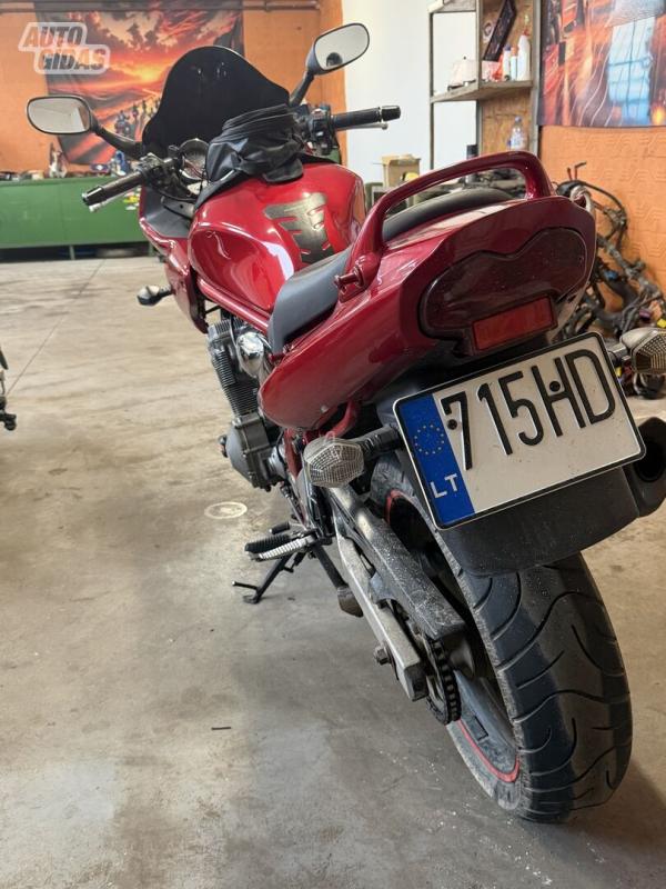 Sarkans Suzuki GSF 2003 Mažeikiai, ar dzinēja tilpumu 0.60 L un nobraukumu 42 tūkst. km par 1500 €, foto 3 vietnē AUTOMOTO.COM.LV