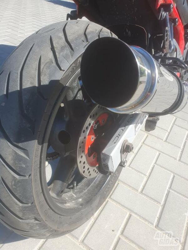 Красный Сузуки GSF 2005 в Алитус, объемом двигателя 0.65 л и пробегом 38 тыс. км за 1750 €, фото 10 на AUTOMOTO.COM.LV