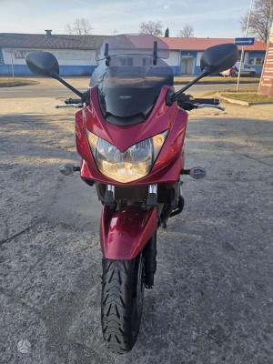 Sarkans Suzuki GSF 2007 Marijampole, ar dzinēja tilpumu 1.25 L un nobraukumu 44 tūkst. km par 2750 €, foto  vietnē AUTOMOTO.COM.LV