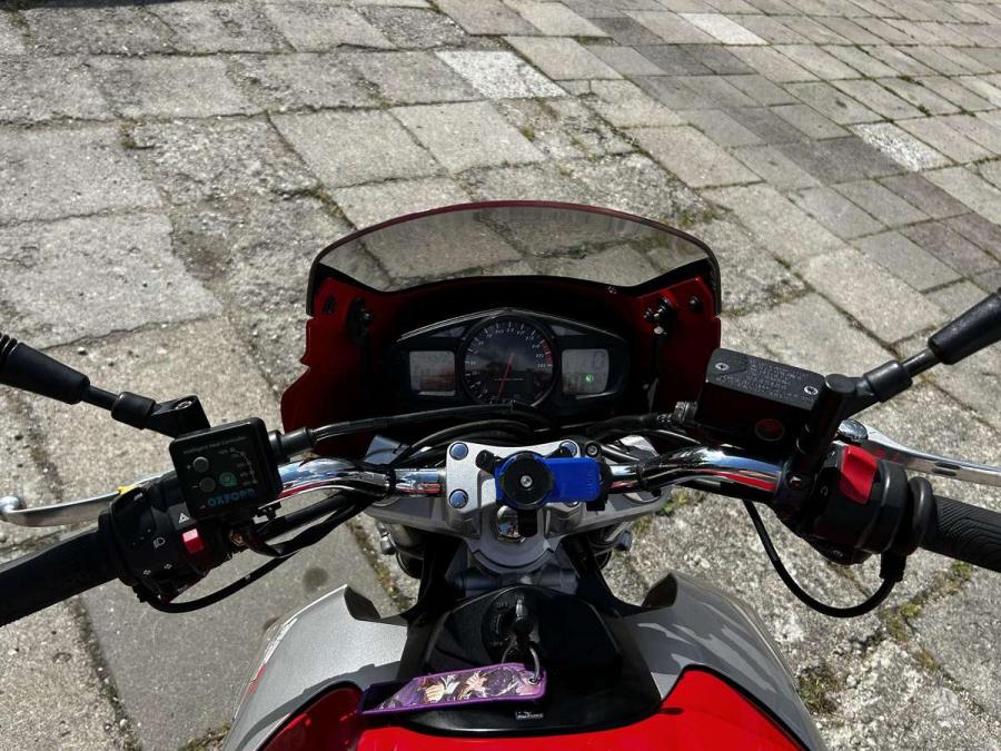 Red Suzuki GSR 2006 in Alytus, with an engine capacity of 0.60 L and mileage of 30 thousand km for 1750 €, photo 7 on AUTOMOTO.COM.LV