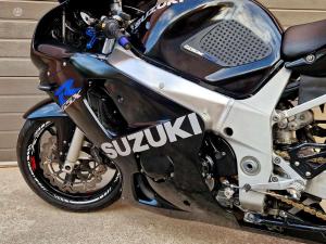 Black Suzuki GSX-R 2002 in Vilnius, with an engine capacity of 0.60 L and mileage of 42 thousand km for 2890 €, photo 16 on AUTOMOTO.COM.LV