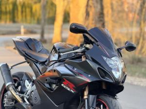 Melns Suzuki GSX-R 2006 Utena, ar dzinēja tilpumu 1.00 L un nobraukumu 72 tūkst. km par 4700 €, foto  vietnē AUTOMOTO.COM.LV