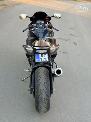 Melns Suzuki GSX-R 2006 Utena, ar dzinēja tilpumu 1.00 L un nobraukumu 72 tūkst. km par 4700 €, foto 14 vietnē AUTOMOTO.COM.LV