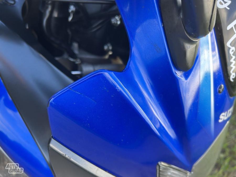 Blue Suzuki GSX-R 2006 in Utena, with an engine capacity of 0.75 L and mileage of 43 thousand km for 4399 €, photo 14 on AUTOMOTO.COM.LV
