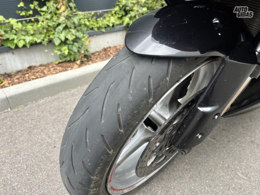 Sarkans Suzuki GSX-R 2006 Klaipėda, ar dzinēja tilpumu 0.75 L un nobraukumu 39 tūkst. km par 4500 €, foto 15 vietnē AUTOMOTO.COM.LV