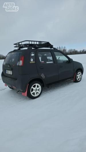 Black Suzuki Ignis 2002 in Kaunas, with an engine capacity of 1.30 L and mileage of 196 thousand km for 1350 €, photo 4 on AUTOMOTO.COM.LV