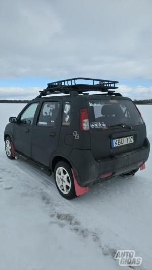 Black Suzuki Ignis 2002 in Kaunas, with an engine capacity of 1.30 L and mileage of 196 thousand km for 1350 €, photo 7 on AUTOMOTO.COM.LV