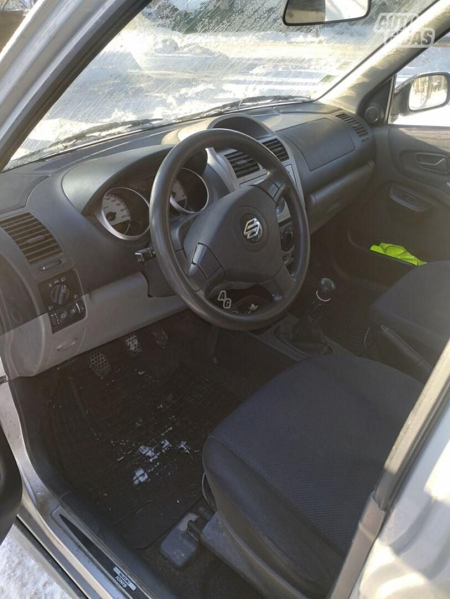 Pelēks Suzuki Ignis 2006 Viļņa, ar dzinēja tilpumu 1.50 L un nobraukumu 217 tūkst. km par 1000 €, foto 8 vietnē AUTOMOTO.COM.LV