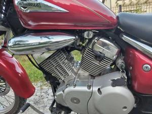 Red Suzuki Intruder 1999 in Vilnius, with an engine capacity of 0.13 L and mileage of 30 thousand km for 3400 €, photo  on AUTOMOTO.COM.LV