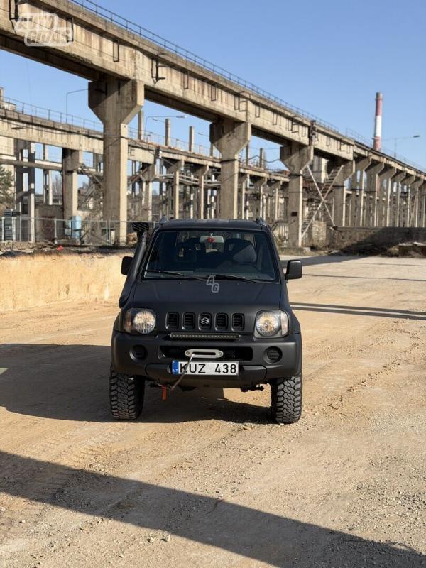 Melns Suzuki Jimny 2002 Panevēža, ar dzinēja tilpumu 1.60 L un nobraukumu 218 tūkst. km par 6000 €, foto 2 vietnē AUTOMOTO.COM.LV