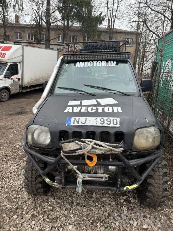 Melns Suzuki Jimny 2006 Rīga, ar dzinēja tilpumu 1.60 L un nobraukumu 160 tūkst. km par 6900 €, foto 1 vietnē AUTOMOTO.COM.LV