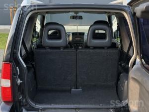 Black Suzuki Jimny 2009 in Riga, with an engine capacity of 1.30 L and mileage of 148 thousand km for 8750 €, photo 18 on AUTOMOTO.COM.LV