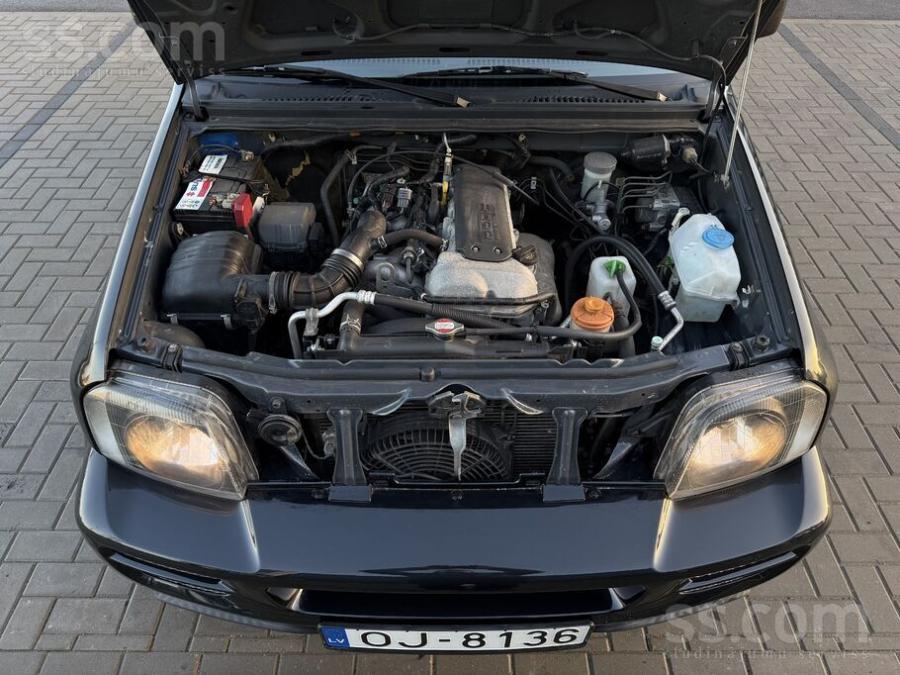 Black Suzuki Jimny 2009 in Riga, with an engine capacity of 1.30 L and mileage of 148 thousand km for 8750 €, photo 20 on AUTOMOTO.COM.LV