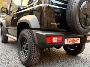 Black Suzuki Jimny 2023 in Kaunas, with an engine capacity of 1.50 L and mileage of 50 thousand km for 32134 €, photo 19 on AUTOMOTO.COM.LV