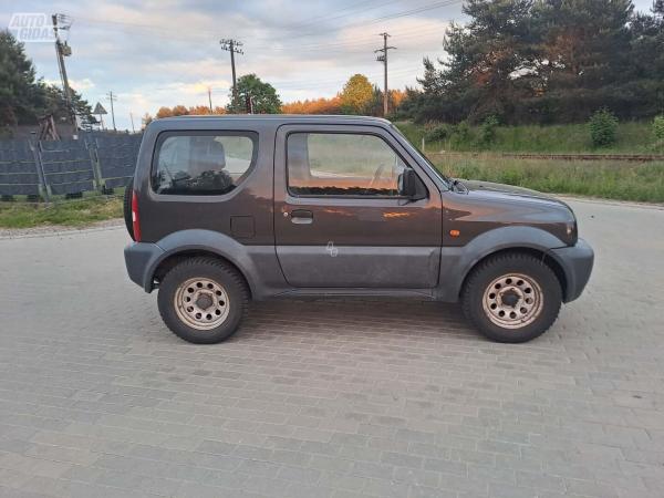Brown Suzuki Jimny 2011 in Vilnius, with an engine capacity of 1.30 L and mileage of 220 thousand km for 5950 €, photo 1 on AUTOMOTO.COM.LV