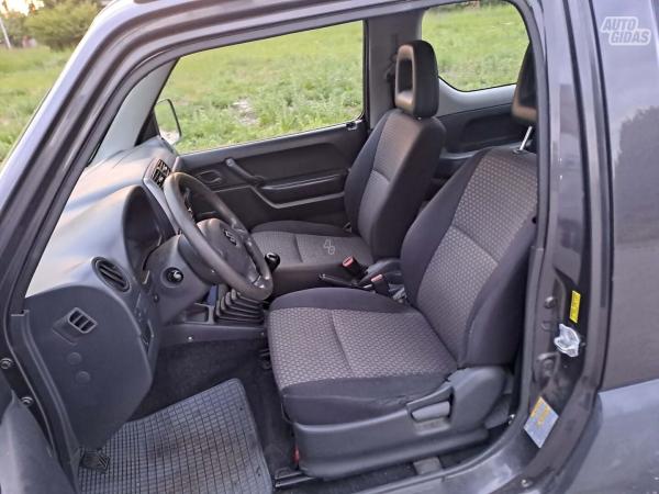 Brown Suzuki Jimny 2011 in Vilnius, with an engine capacity of 1.30 L and mileage of 220 thousand km for 5950 €, photo 5 on AUTOMOTO.COM.LV
