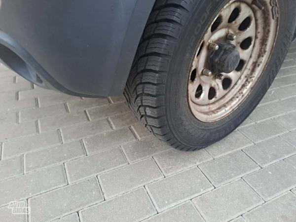 Brown Suzuki Jimny 2011 in Vilnius, with an engine capacity of 1.30 L and mileage of 220 thousand km for 5950 €, photo 6 on AUTOMOTO.COM.LV