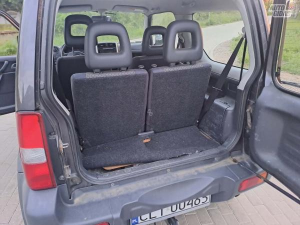 Brown Suzuki Jimny 2011 in Vilnius, with an engine capacity of 1.30 L and mileage of 220 thousand km for 5950 €, photo 10 on AUTOMOTO.COM.LV